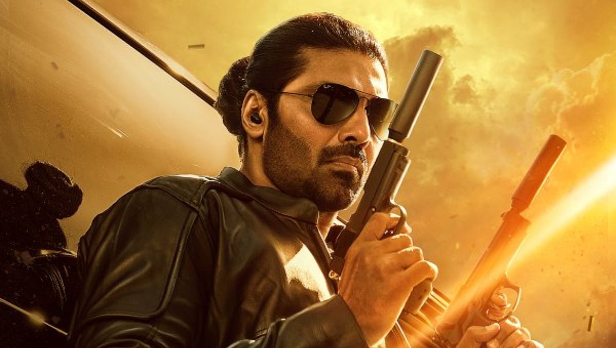 Arya holds two pistols and looks suave in the new poster from Mr X